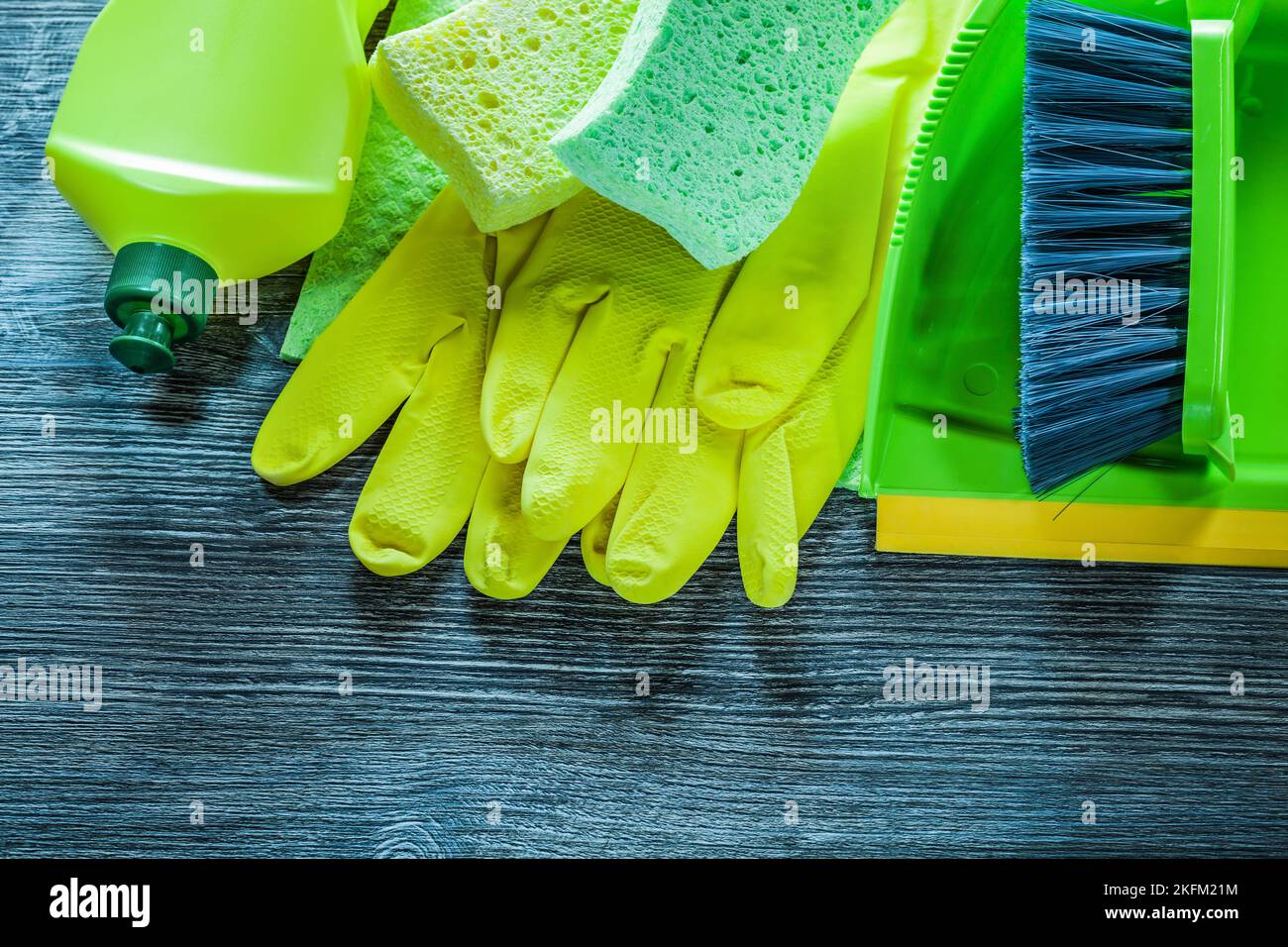 Composition of household cleaning tools on vintage wooden board Stock ...