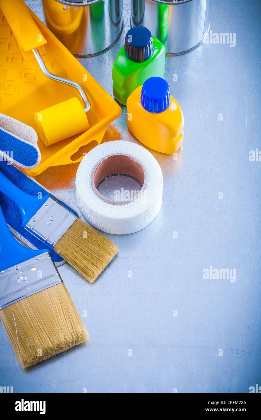 Composition of paint objects on metallic background construction ...