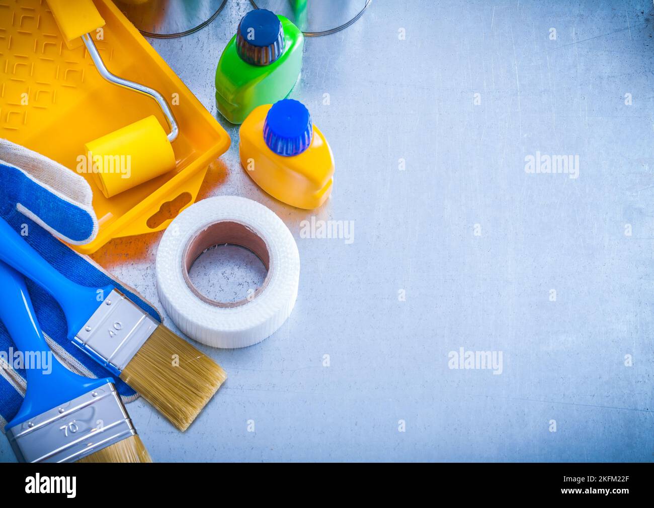 Composition of paint objects on metallic background copy space image ...