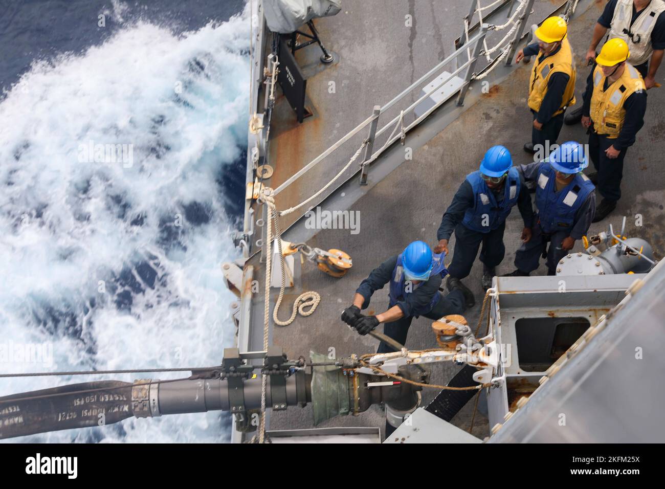 SOUTH CHINA SEA (Sept. 24, 2022) Sailors disconnect a fuel probe from a ...