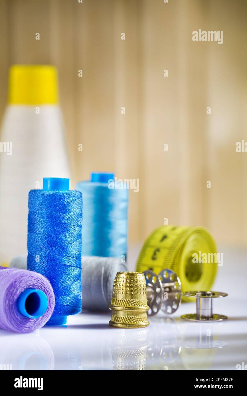 composition of sewing items on a white wooden table Stock Photo - Alamy