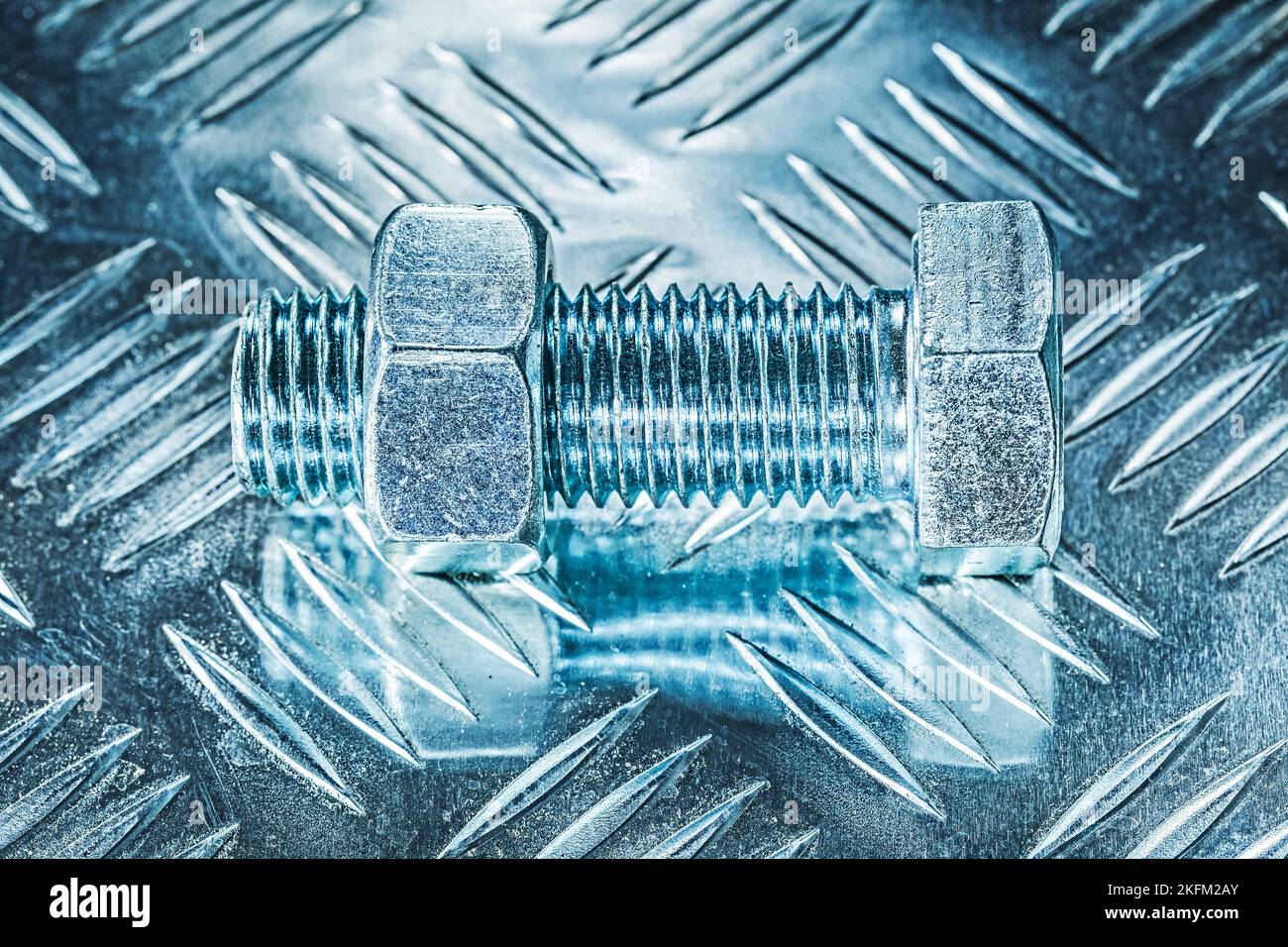 Construction bolts nuts on corrugated metal background Stock Photo - Alamy