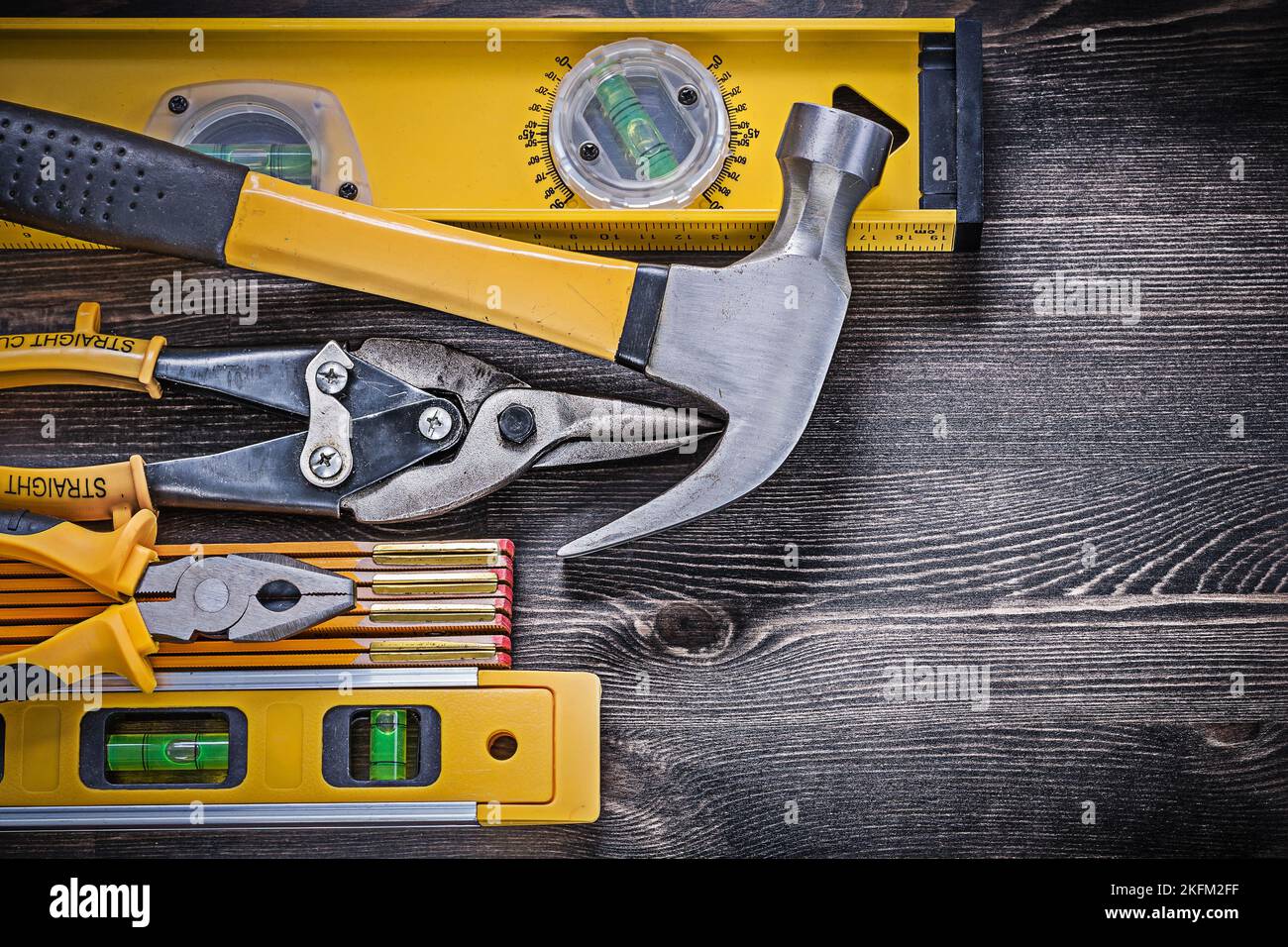 Construction level wooden meter pliers tin snips hammer horizontal ...