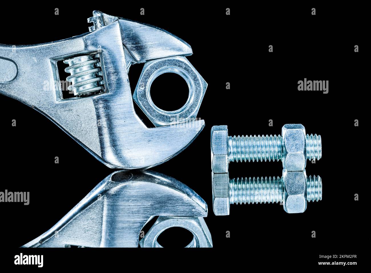 Construction nuts adjustable spanners screwbolts on black background ...