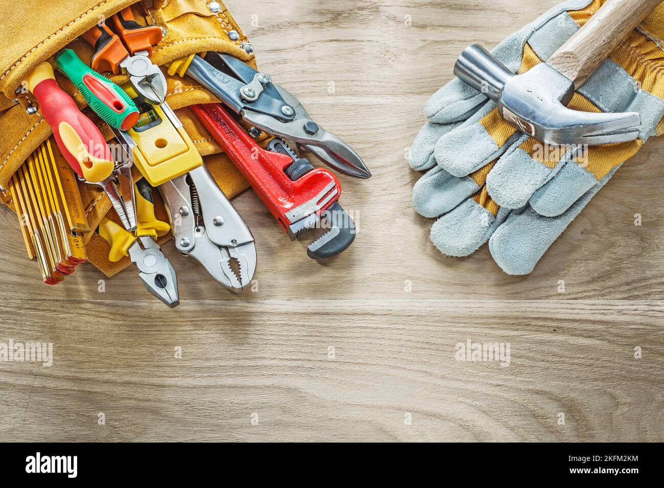 Construction tooling tool belt protective gloves on wooden board Stock ...