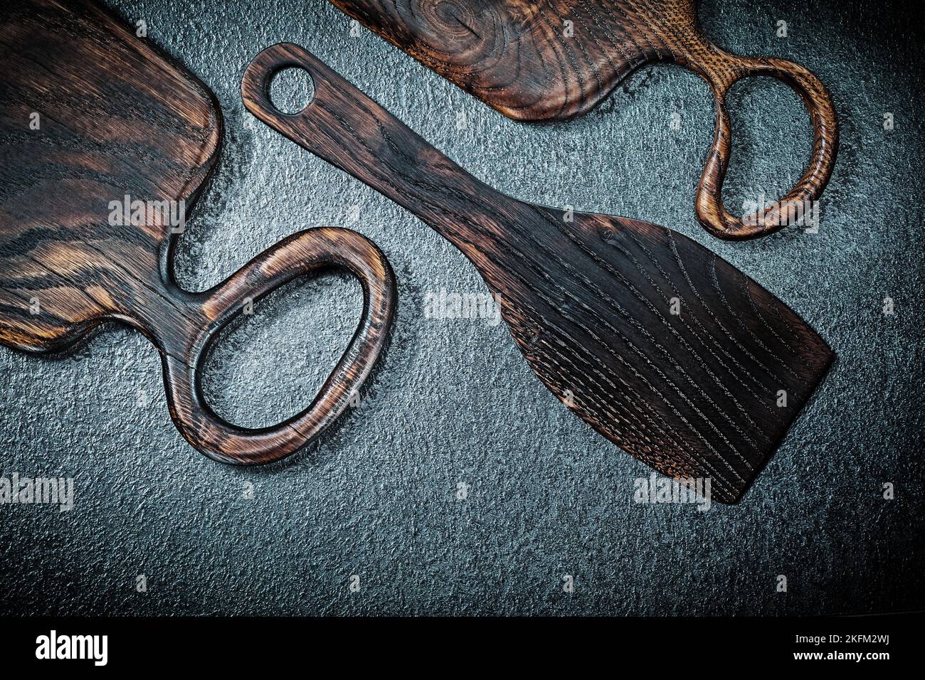 cooking shovel and two serving boards close up Stock Photo - Alamy