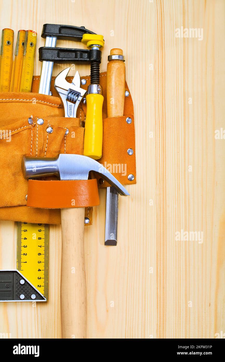 copyspace image of tools on wooden table Stock Photo - Alamy