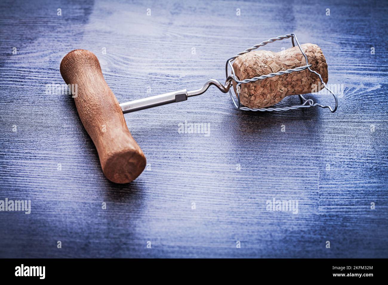 corckscrew and corck of champagne with wire Stock Photo - Alamy
