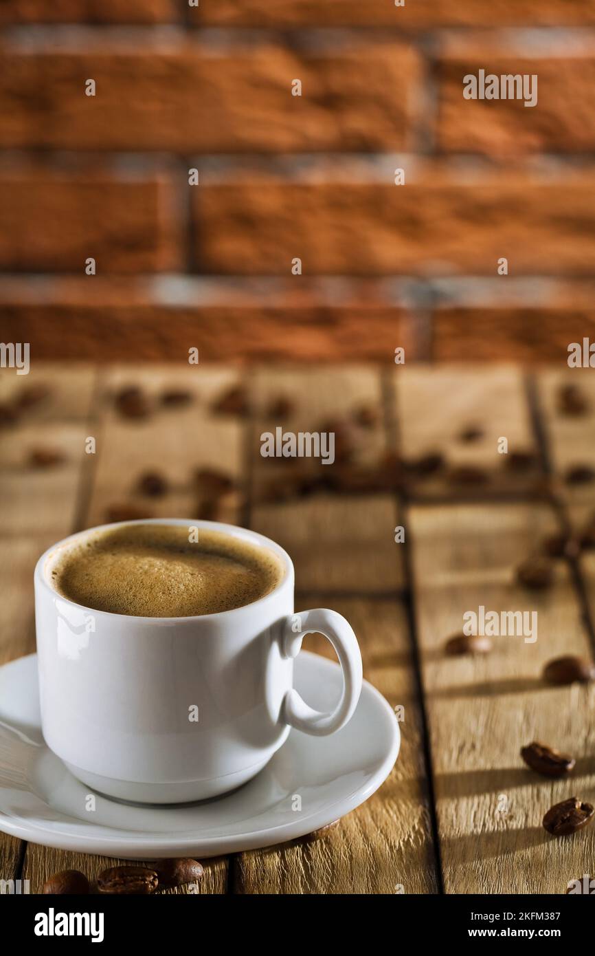 cup with espresso on the wooden boards Stock Photo - Alamy