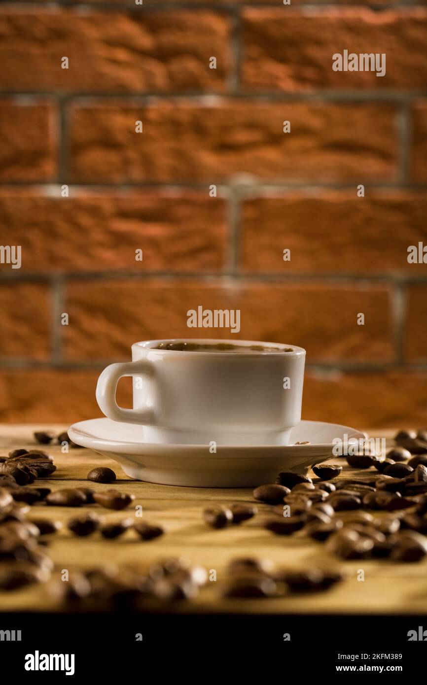 cup of coffee on a desk Stock Photo - Alamy