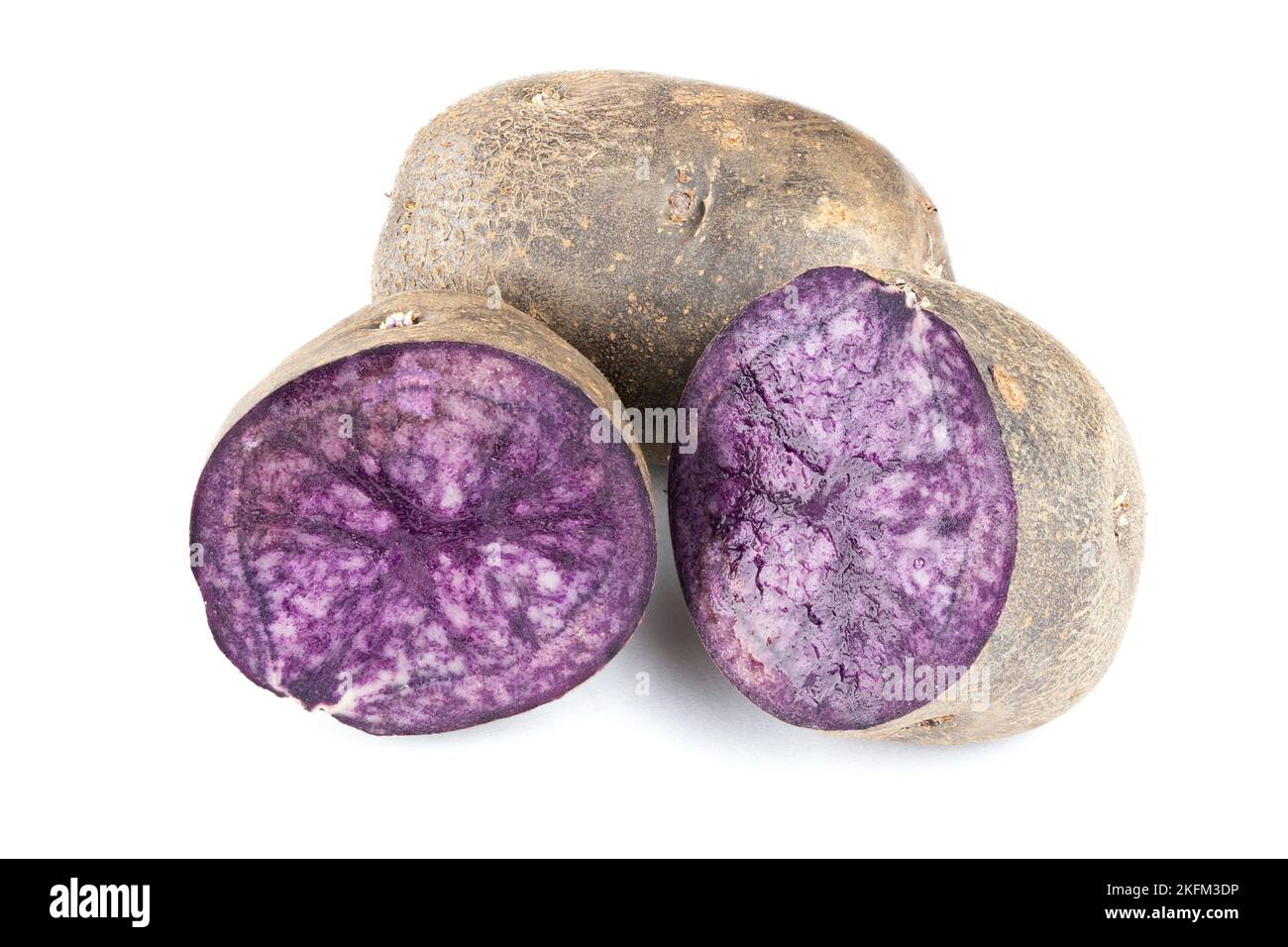 Fresh purple potatoes isolated on white background. Full depth of field ...