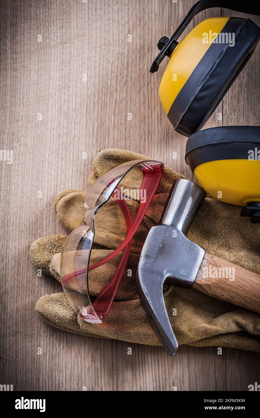 Ear protectors claw hammer leather safety gloves and protective ...