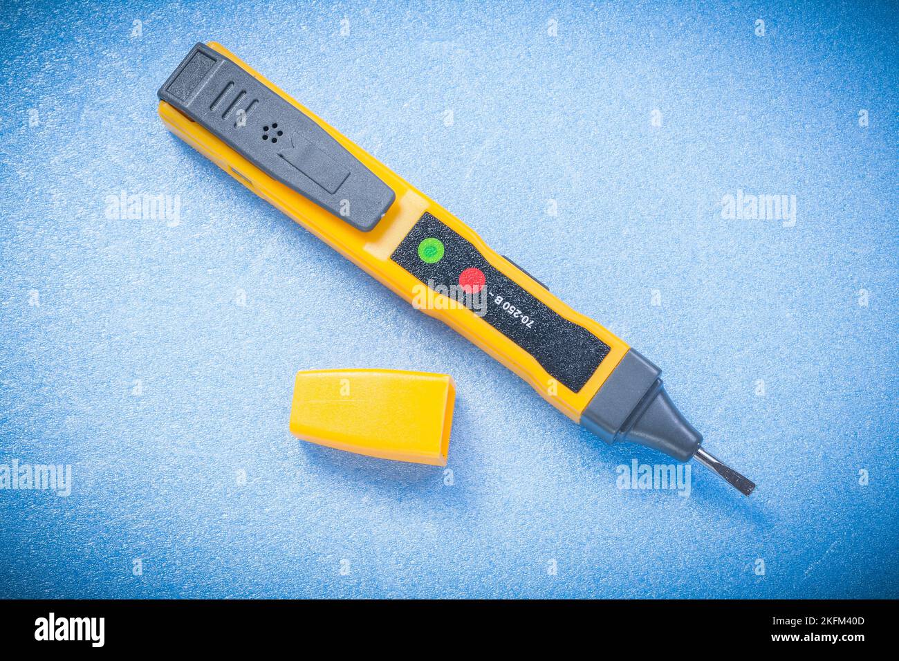 Electrical tester indicating device on blue background electricity ...
