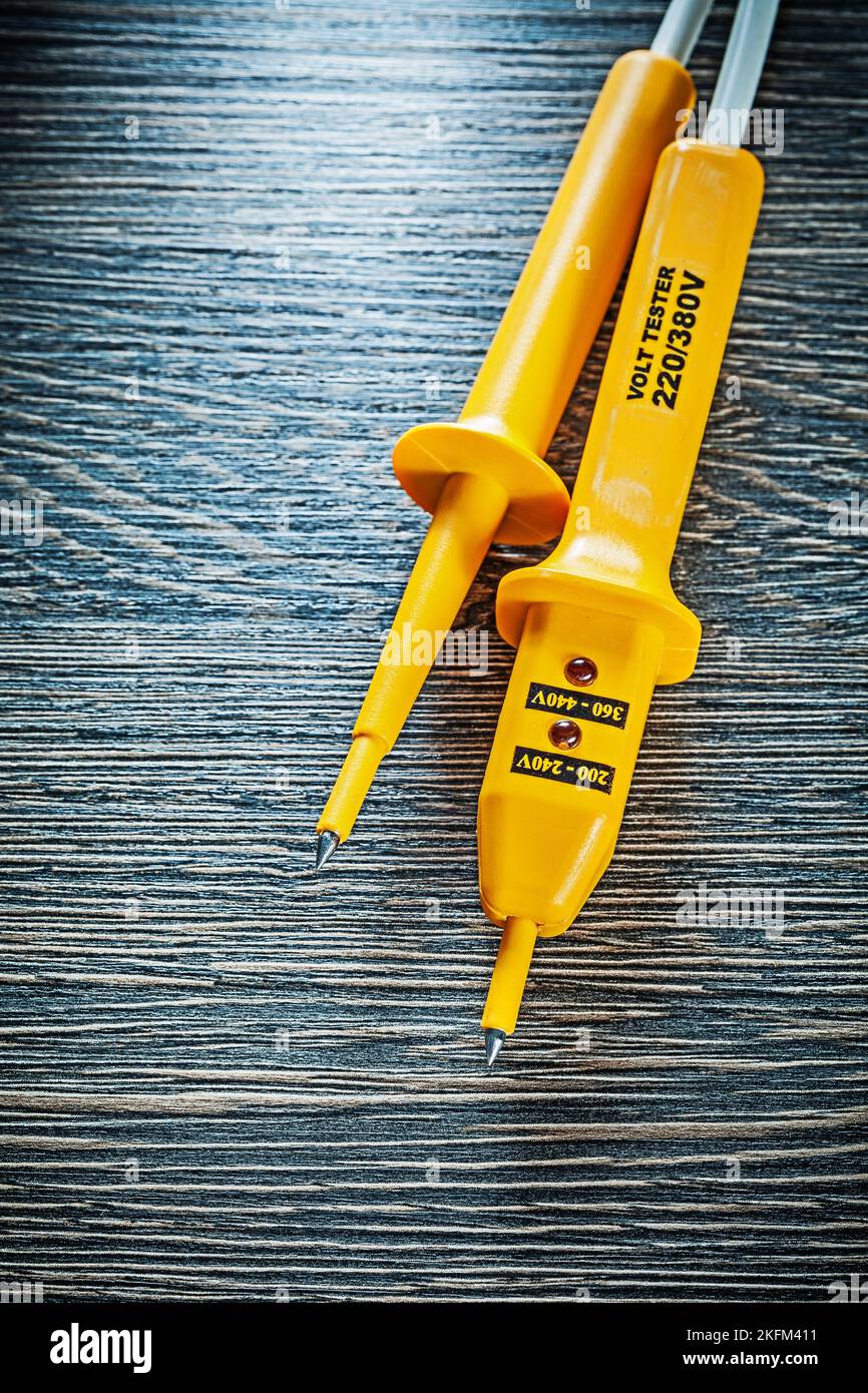 Electrical tester on wooden board electricity concept Stock Photo - Alamy