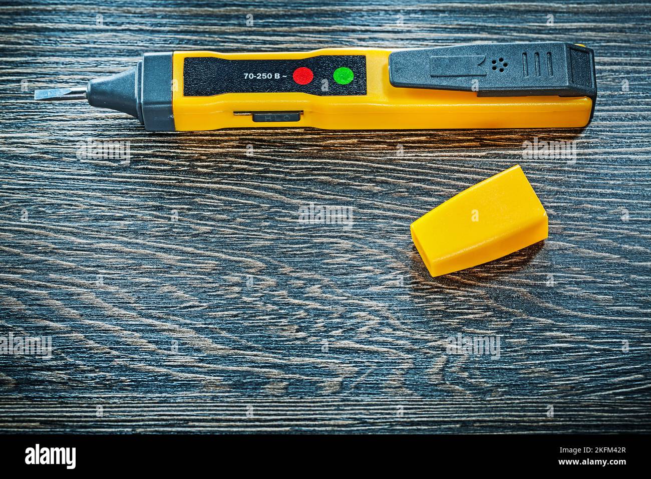 Electrical tester on wooden board top view electricity concept Stock ...