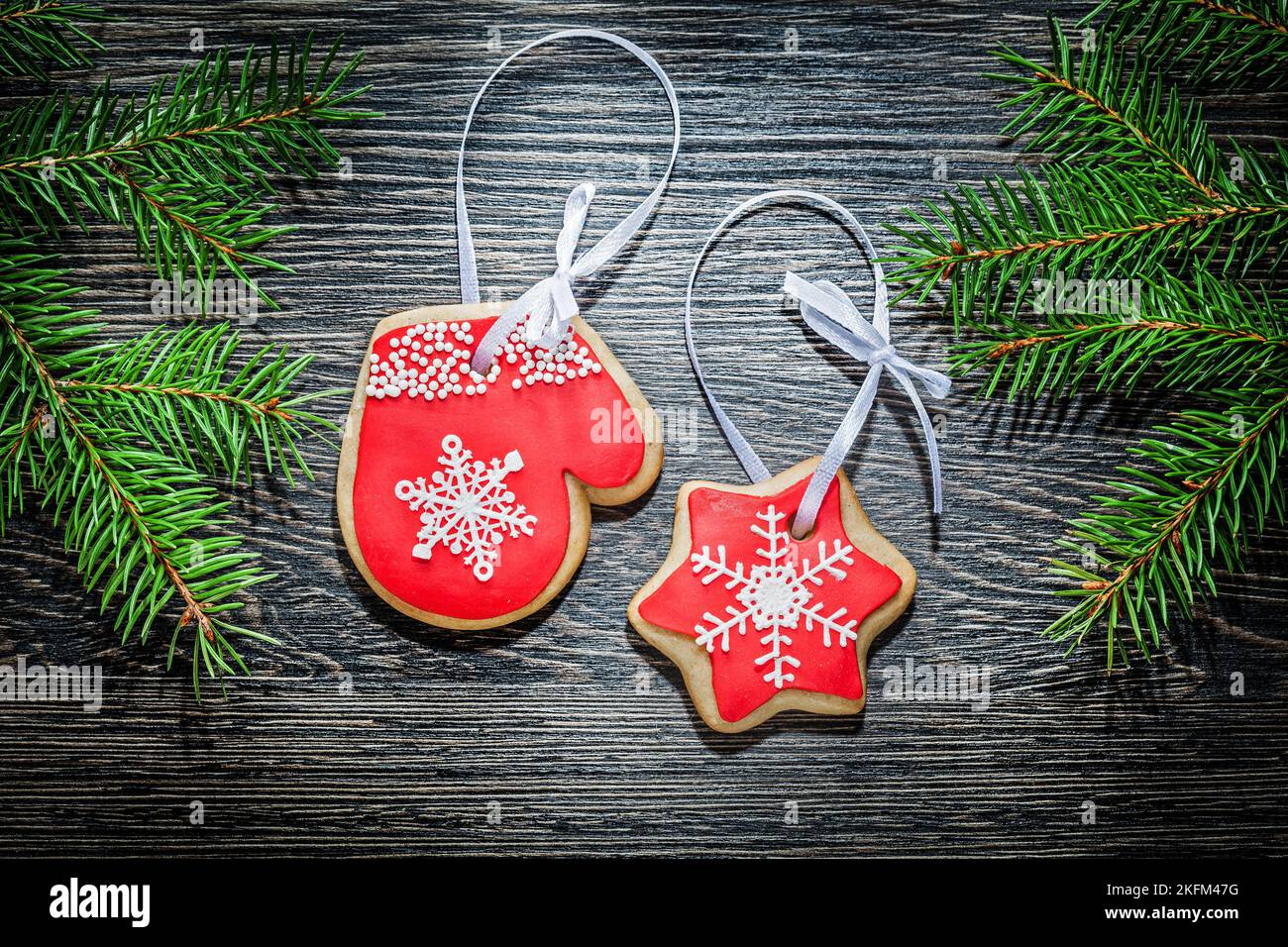 Fir tree branch Christmas gingerbread on wood board Stock Photo - Alamy