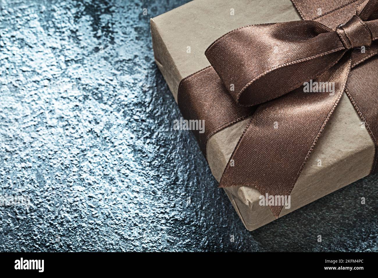 Gift box on black background holidays concept Stock Photo - Alamy