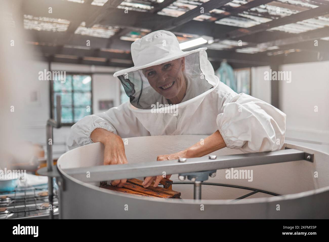Woman, beekeeper and workshop, bee farming for honey and natural ...