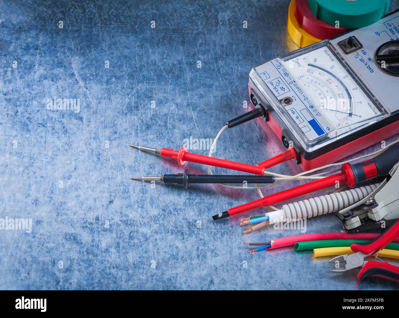 Group of electrical articles on metallic background horizontal version ...