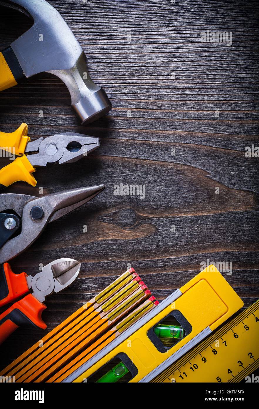 Gripping tongs nippers tin snips claw hammer square ruler construction ...