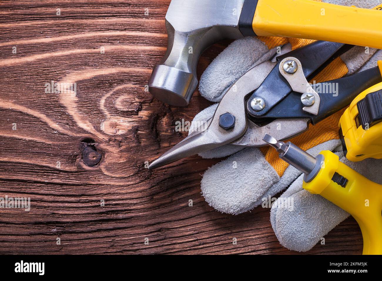 Group of house improvement tools on vintage wood board construction ...