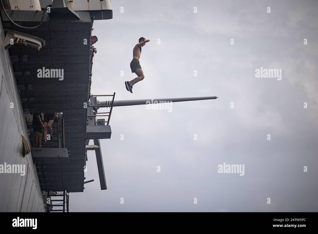 A U.S. Marine with 31st Marine Expeditionary Unit, jumps from the ...