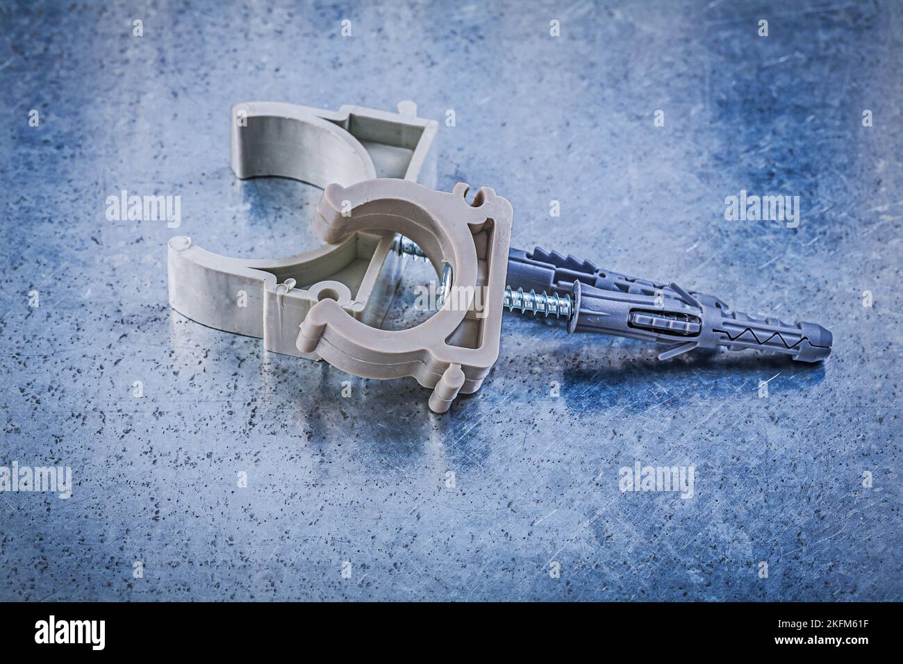 Heap of pipe fixtures on metallic background construction concept Stock ...