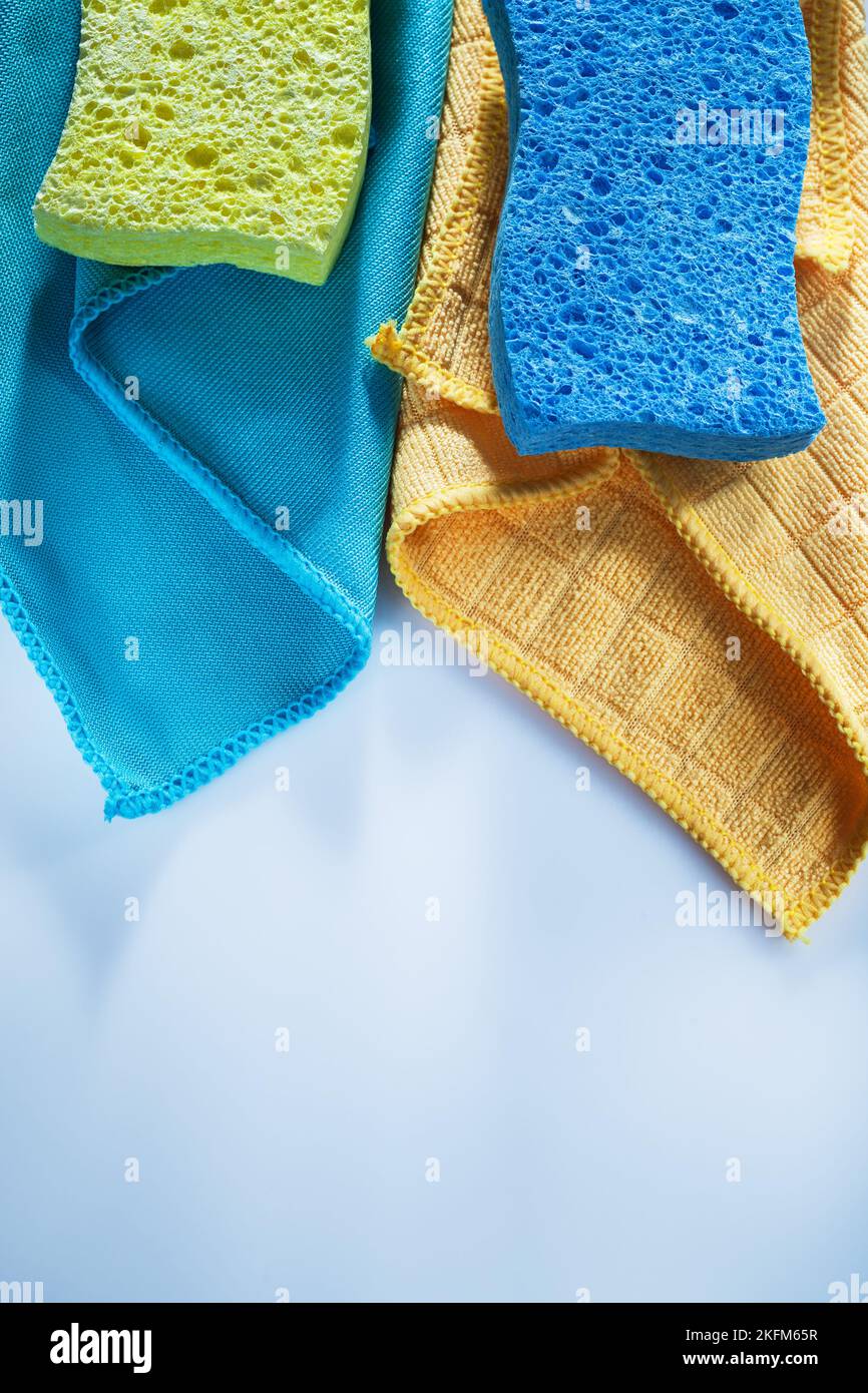 Household washcloth sponges on white surface Stock Photo - Alamy