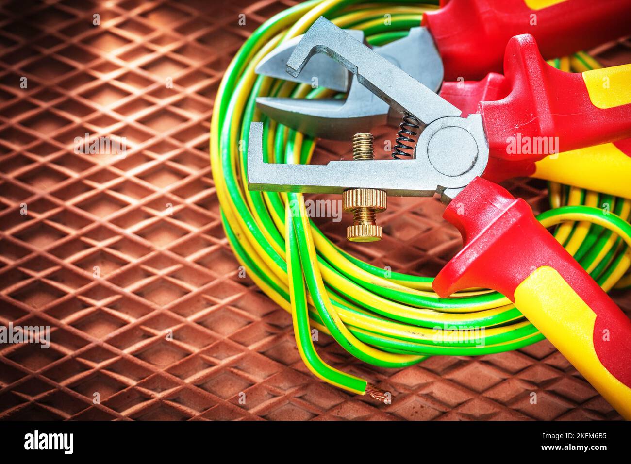 Insulation strippers electric cable on dielectric mat Stock Photo - Alamy