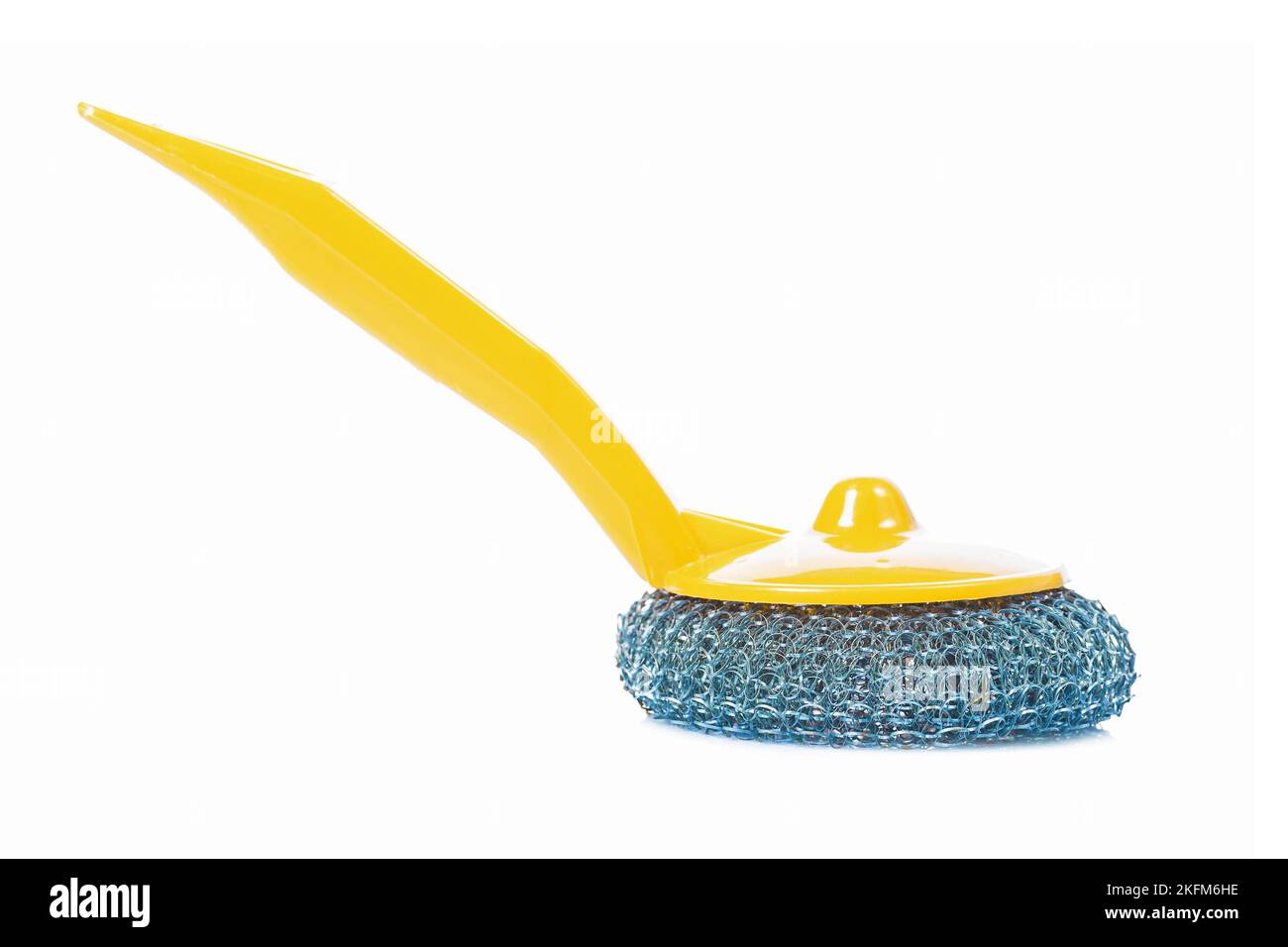 kitchen scrubbrush with yellow handle isolated on white background ...