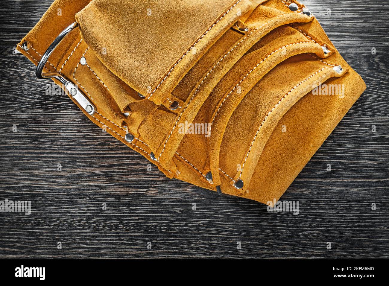 Leather construction belt on wooden board horizontal view Stock Photo ...