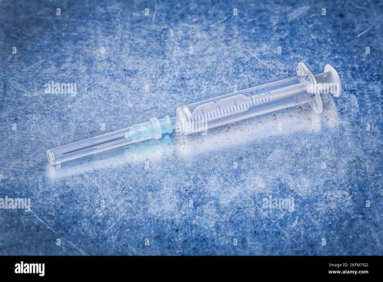 Medical needle syringe on metallic background medicine concept Stock ...