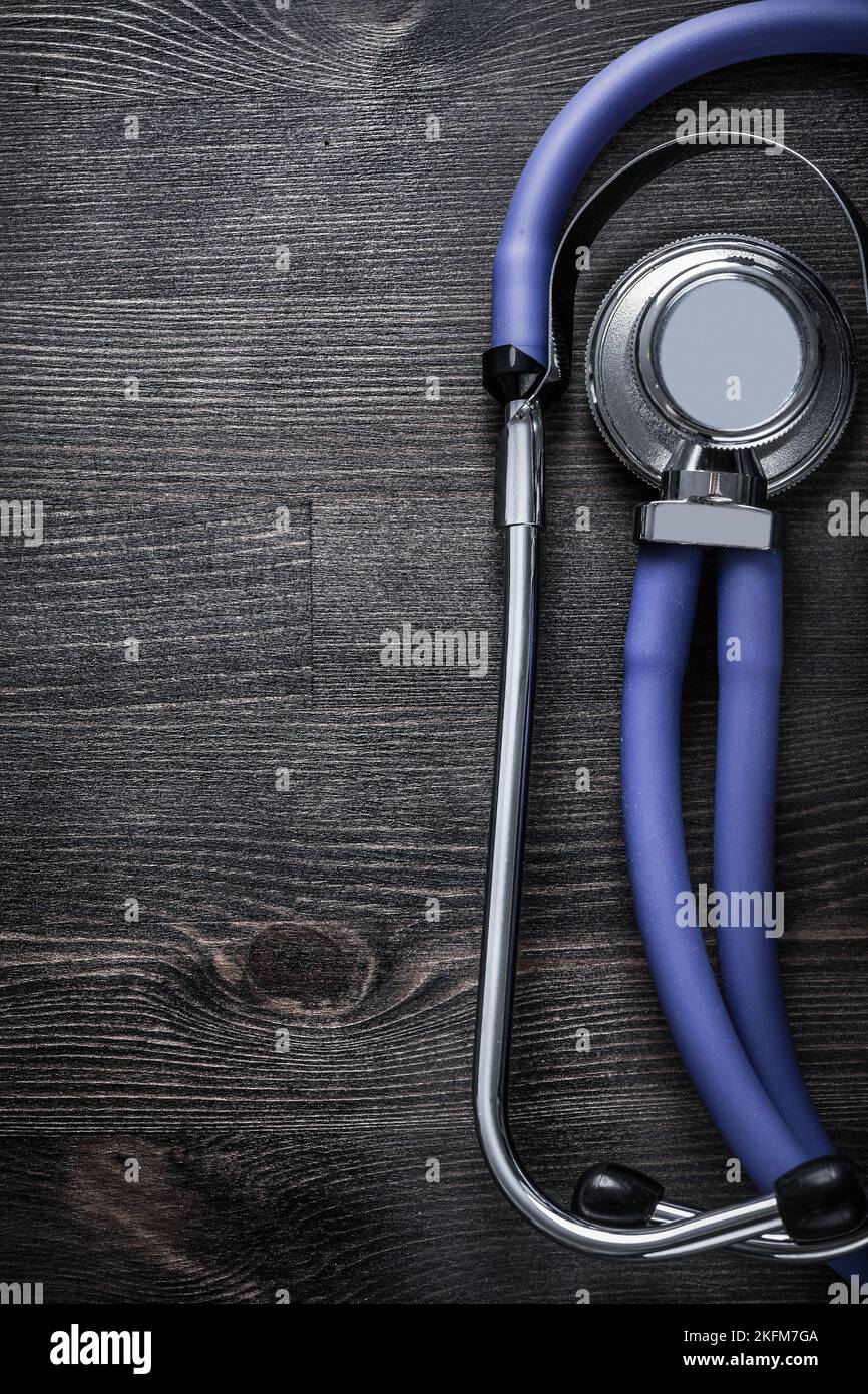 Medical stethoscope on wooden background top view medicine concept ...