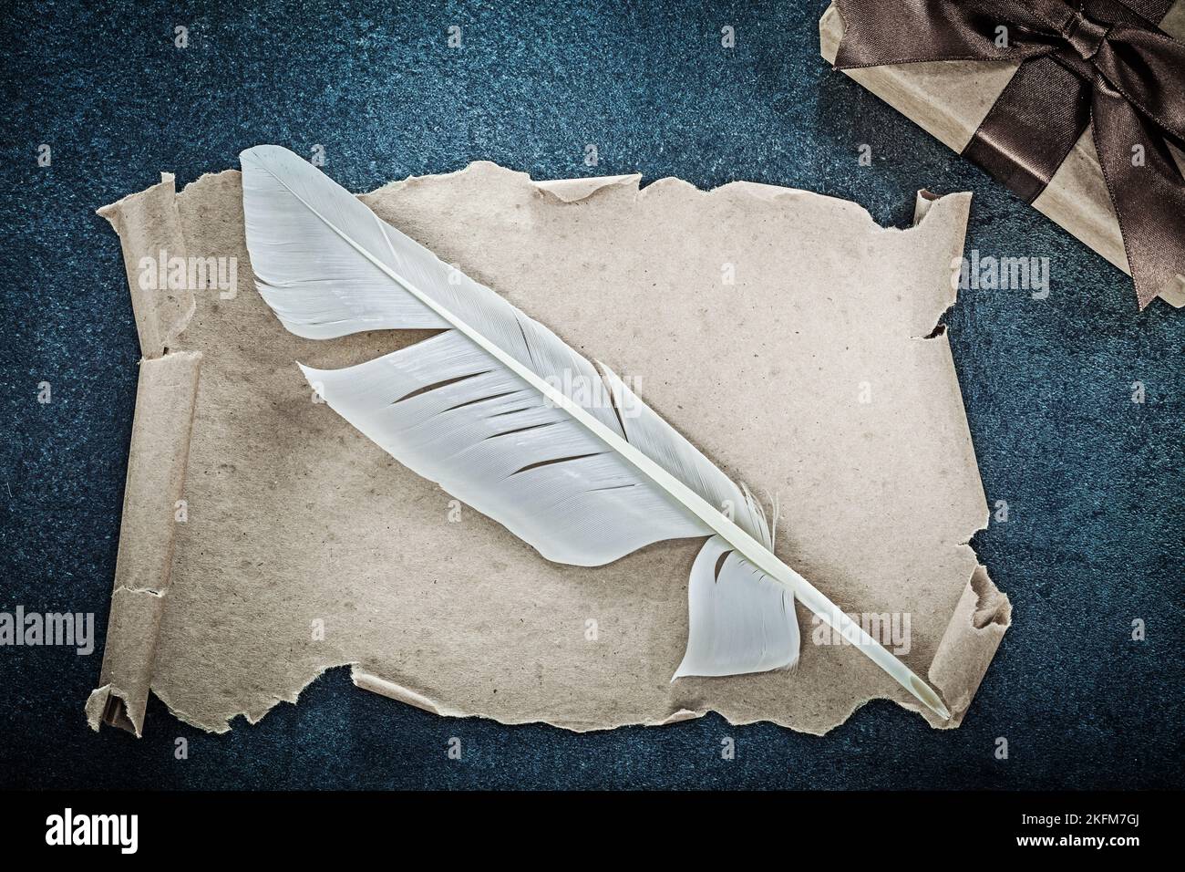 Medieval paper scroll plume present box on black background Stock Photo ...