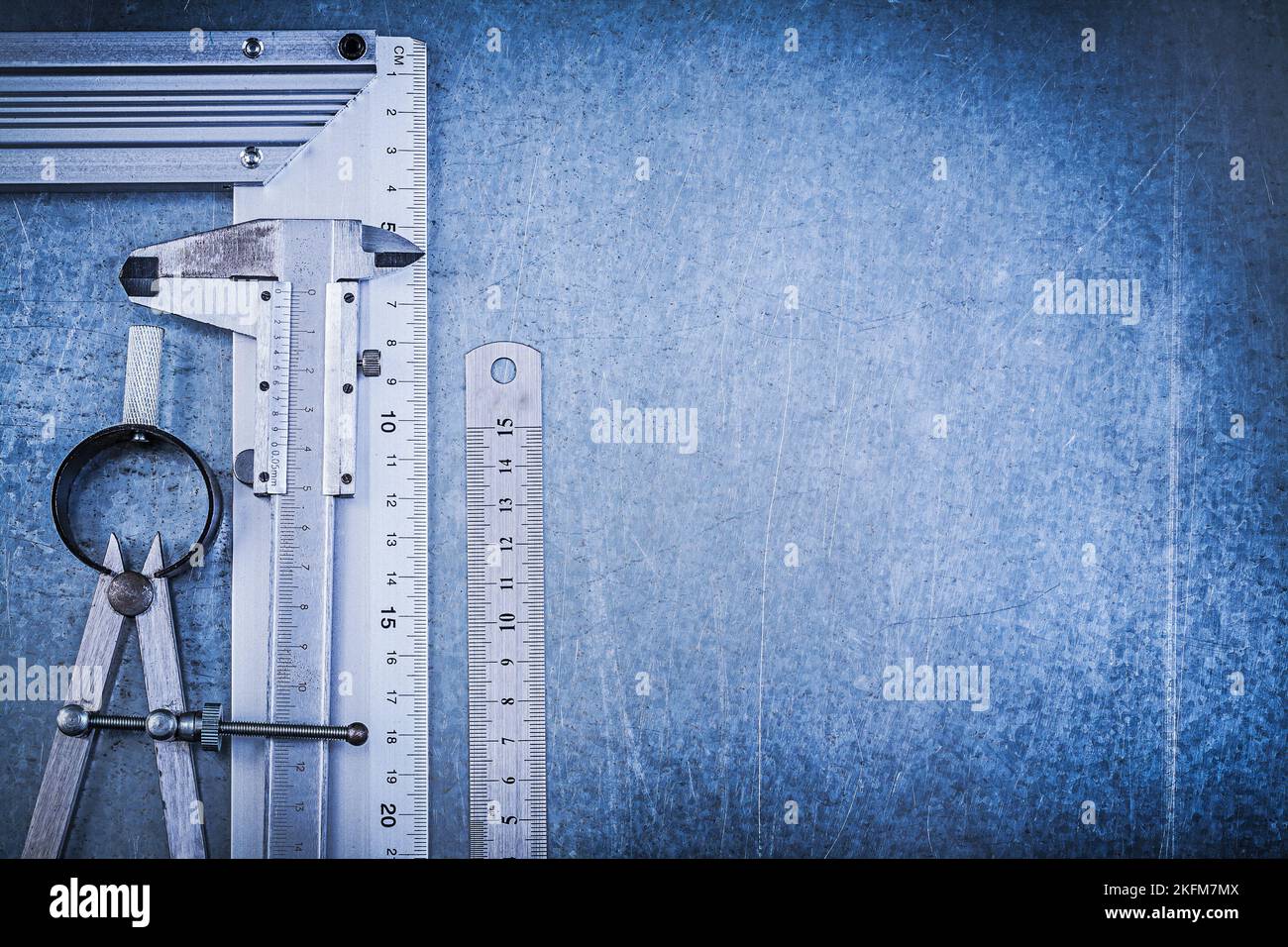 Metal ruler try square slide caliper construction divider on metallic ...