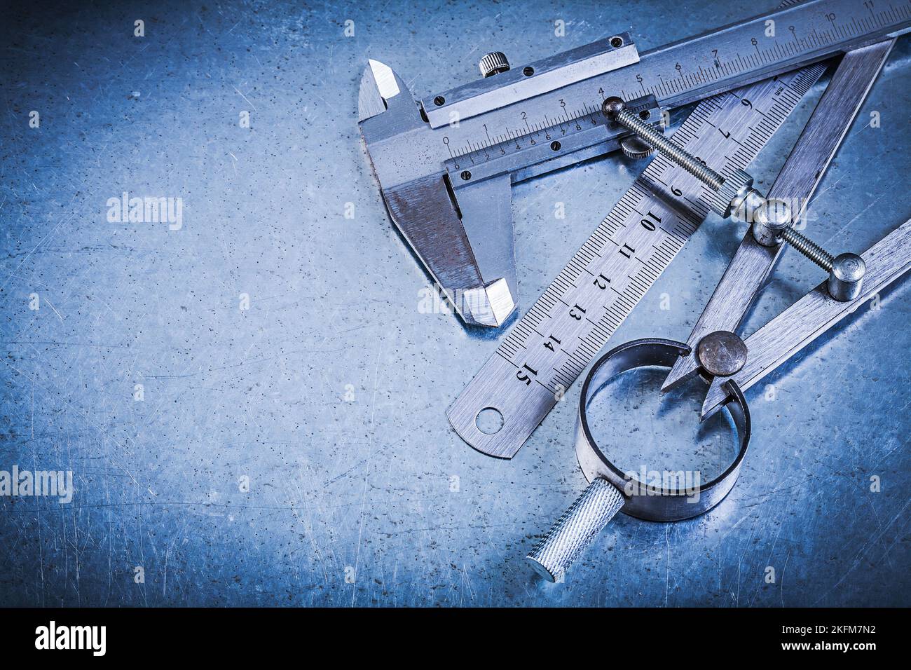 Metal ruler slide caliper construction pair of compasses on metallic ...