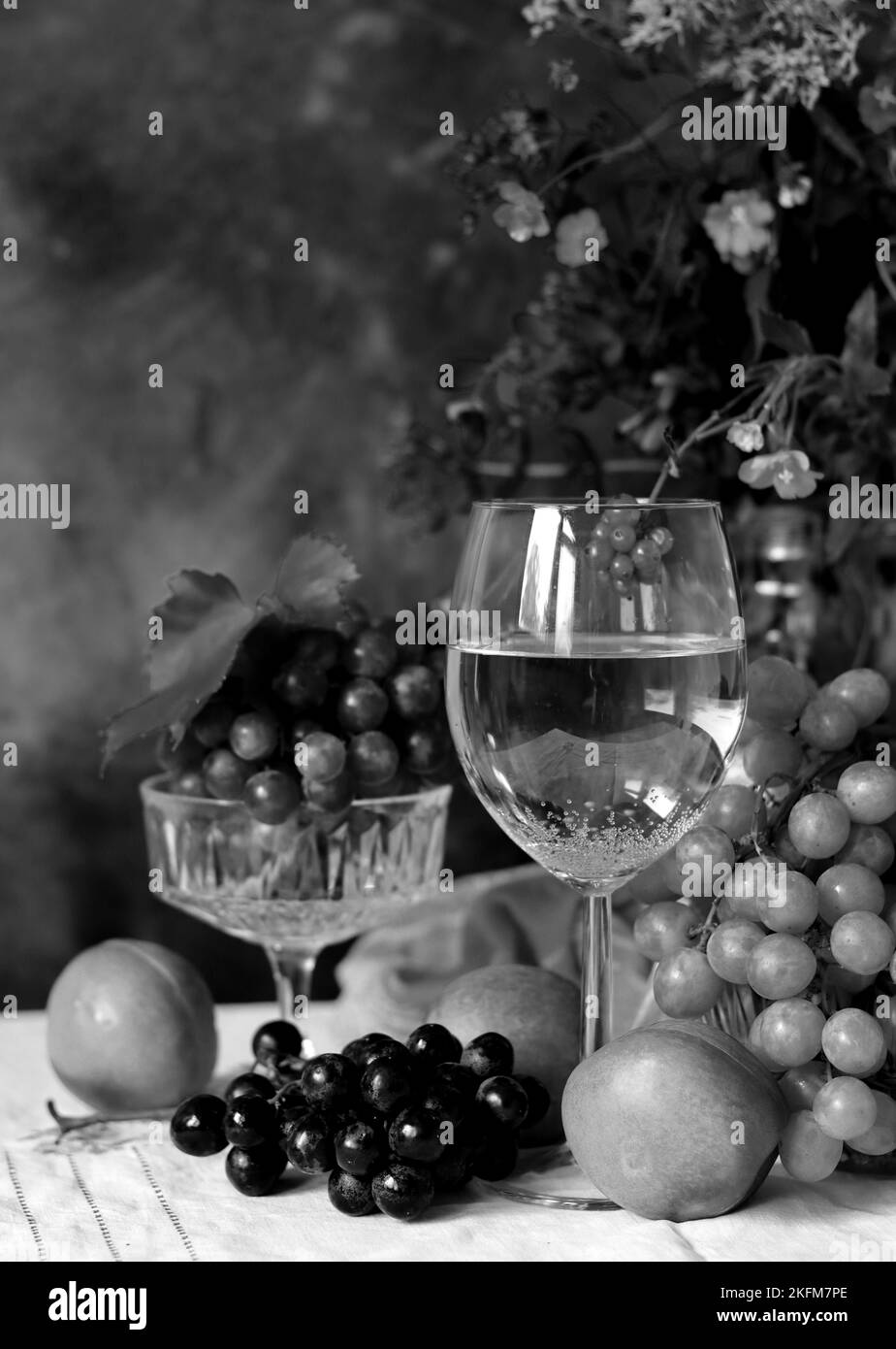 Still life with wine and fruit. Black and white photography Stock Photo ...