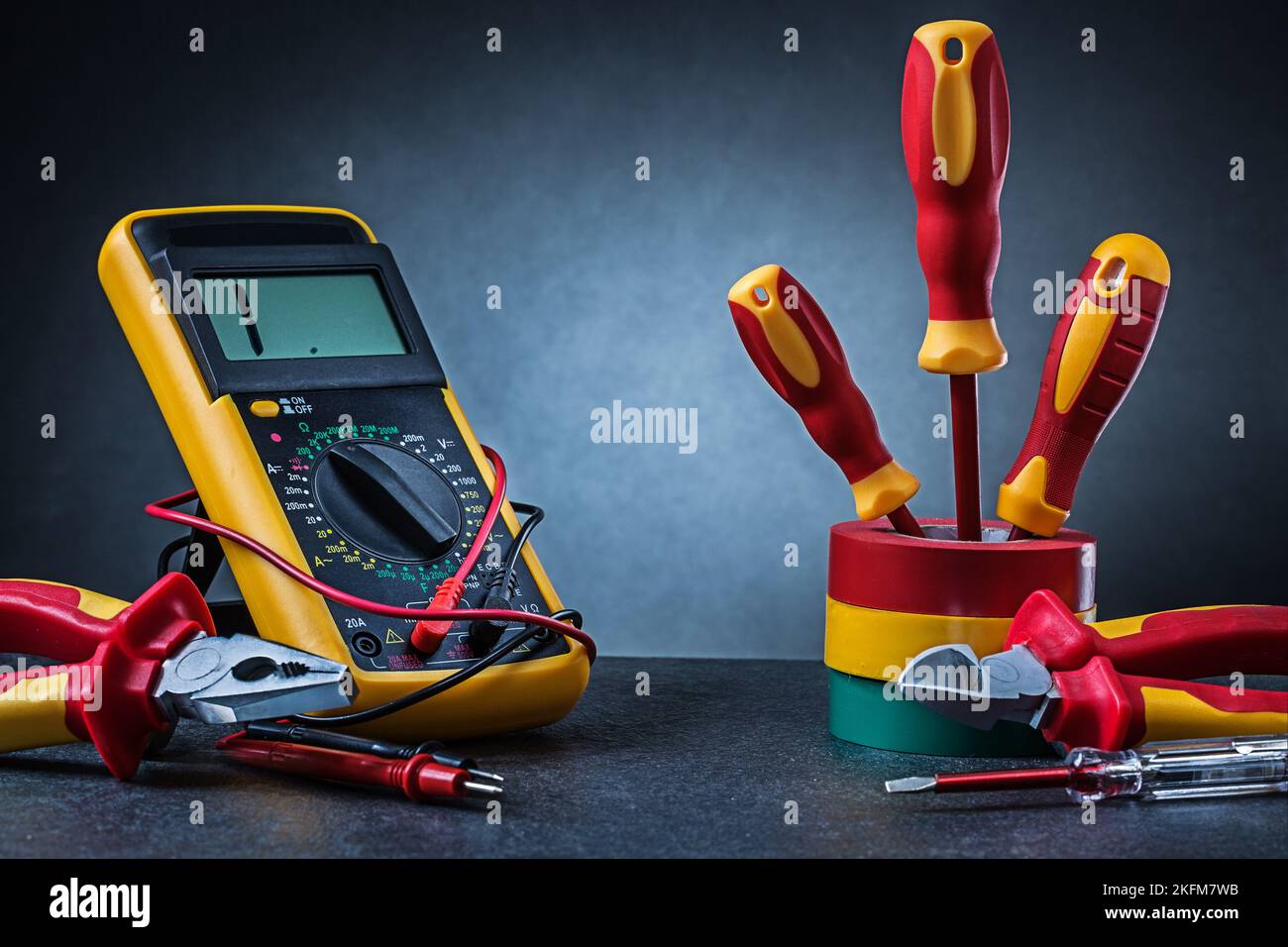 multy colored electrical tools on gradient gray background Stock Photo ...