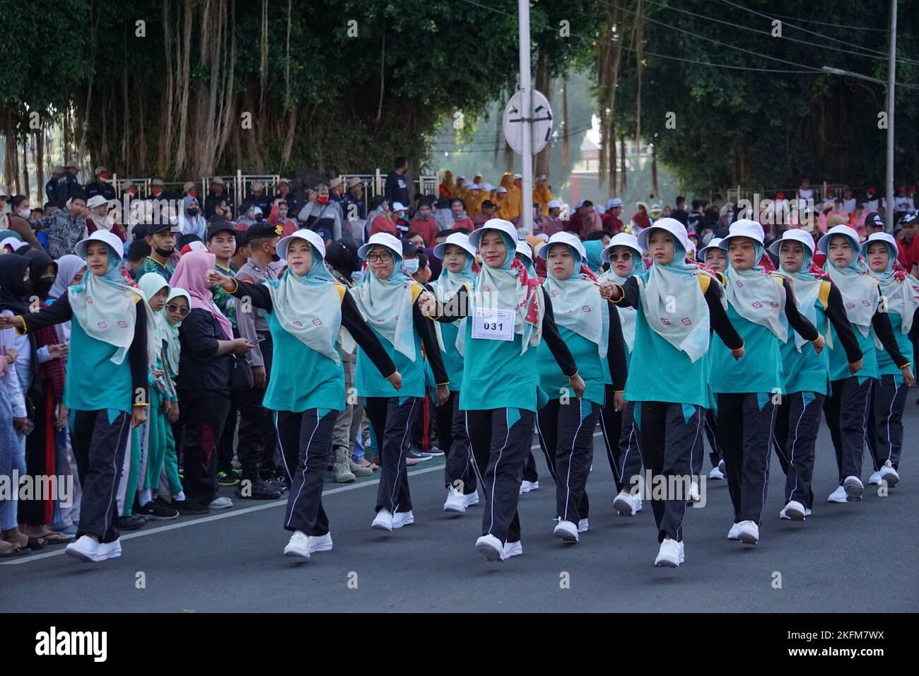 Indonesian participating in marching (baris berbaris) to celebrate ...