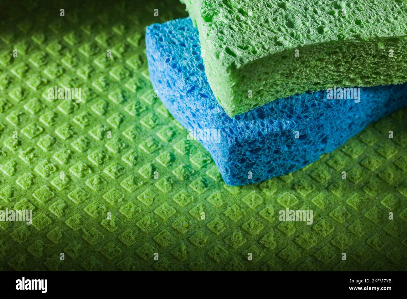New sponge on dishcloth top view Stock Photo - Alamy