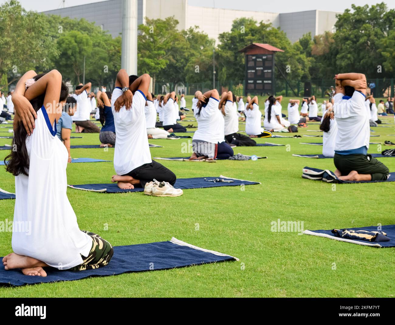 Group Yoga exercise session for people of different age groups at ...