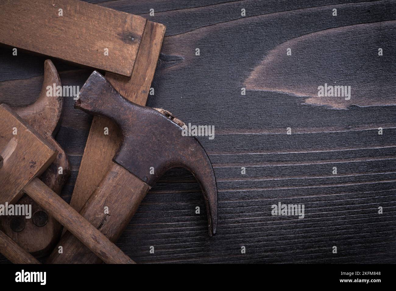 Obsolete hand saw surface gauge claw hammer square ruler Stock Photo ...