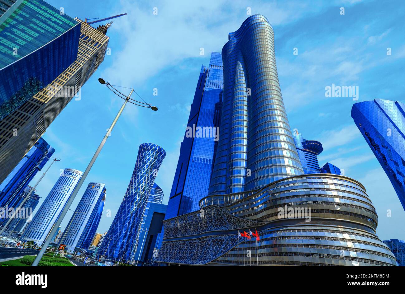 A low angle shot of the futuristic towers in Doha, Qatar Stock Photo ...