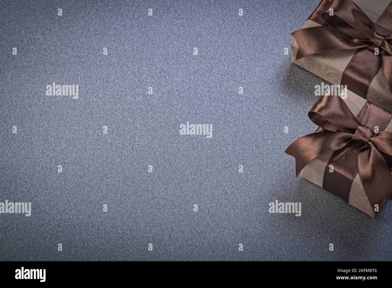Packed giftboxes on grey background copy space celebrations concept ...