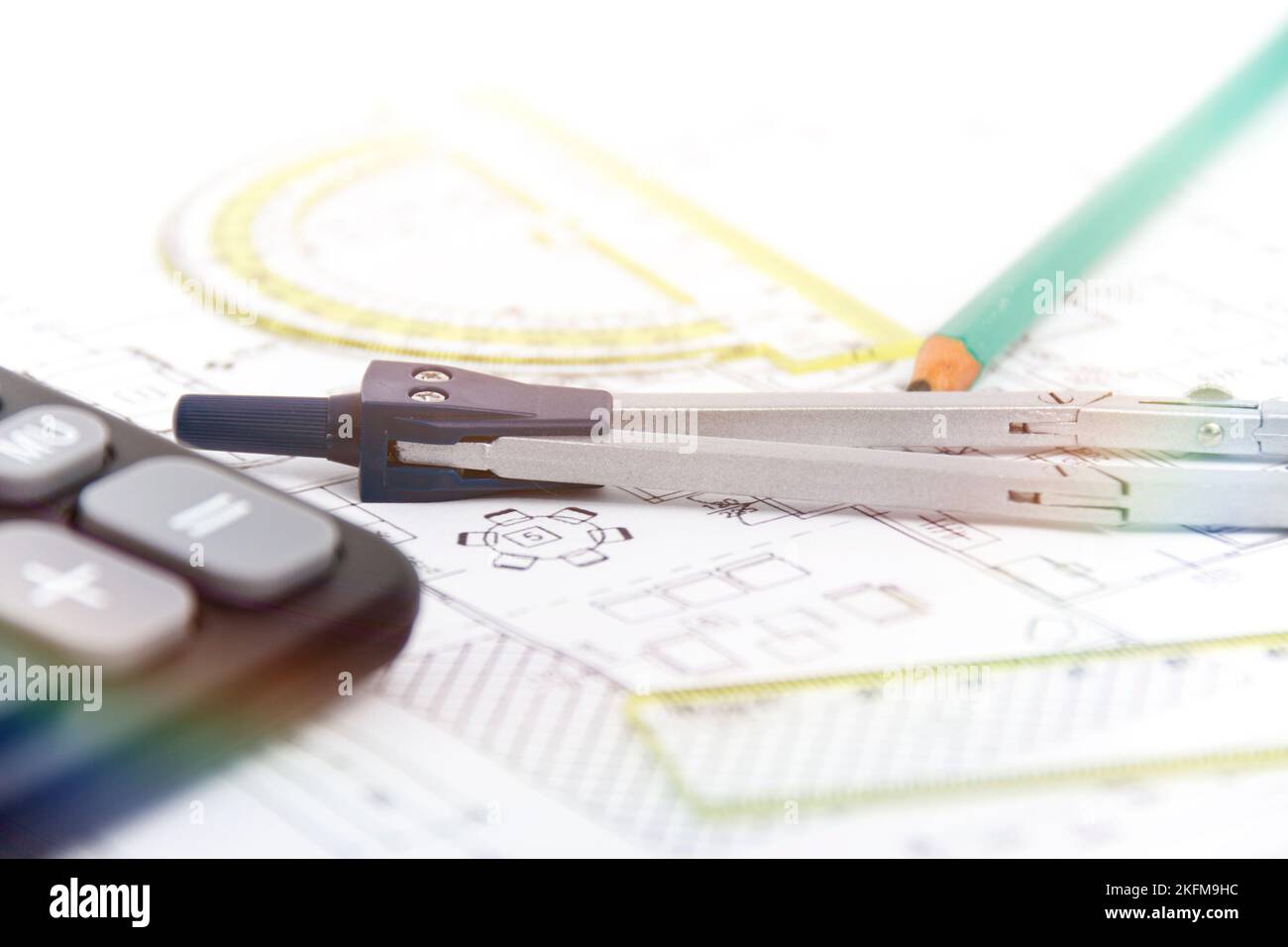 Designing a building or architecture with a ruler, pen, pencil ...