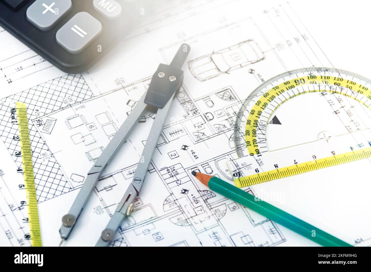 Designing a building or architecture with a ruler, pen, pencil ...