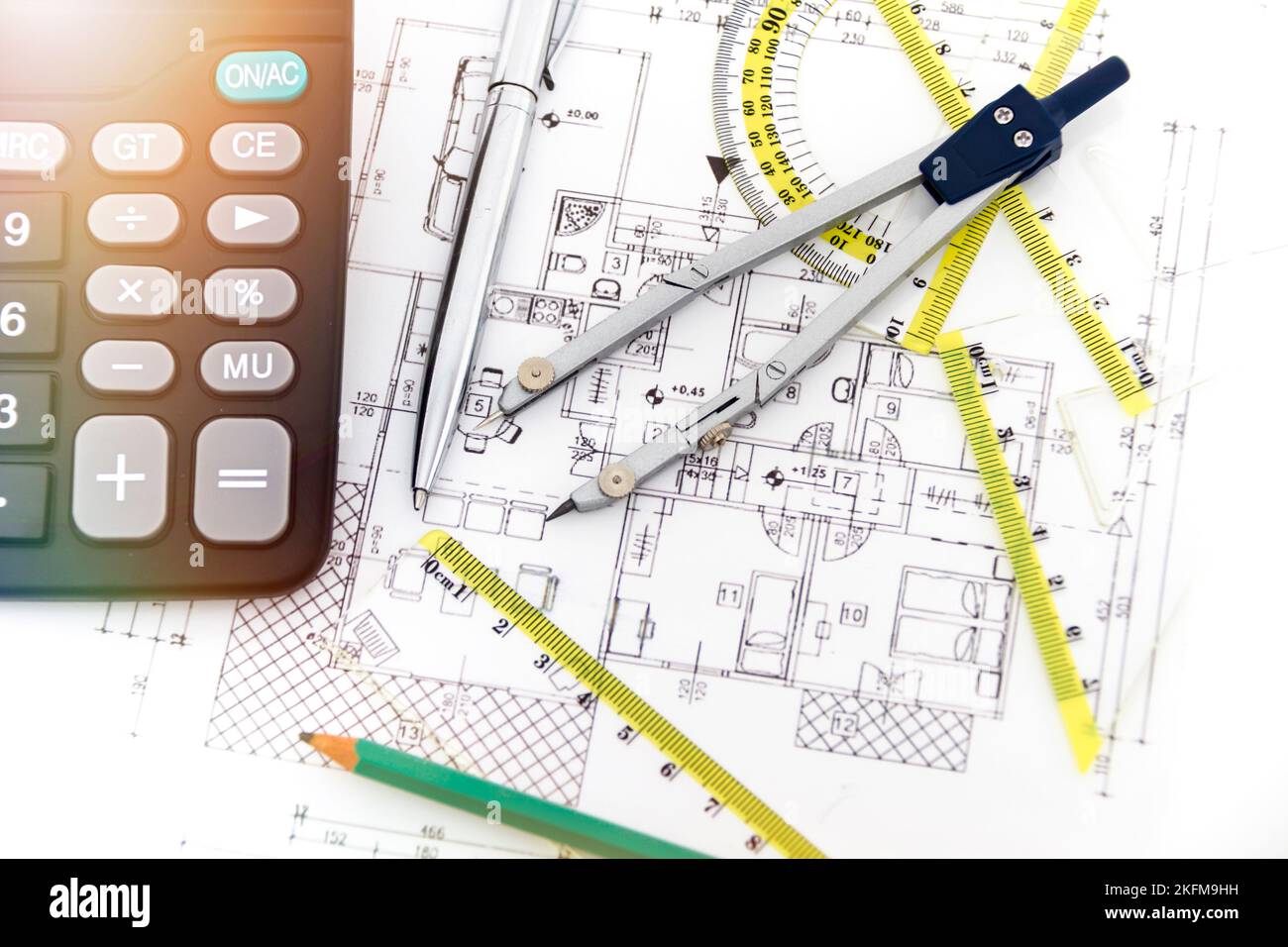 Designing a building or architecture with a ruler, pen, pencil ...