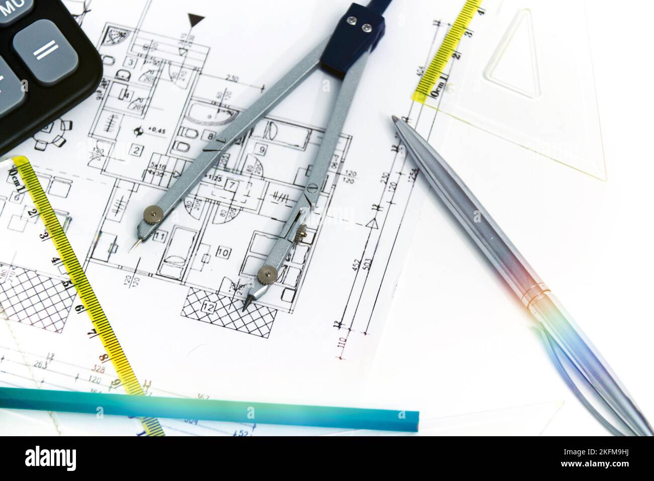 Designing a building or architecture with a ruler, pen, pencil ...