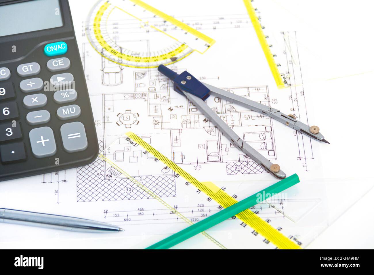 Designing a building or architecture with a ruler, pen, pencil ...