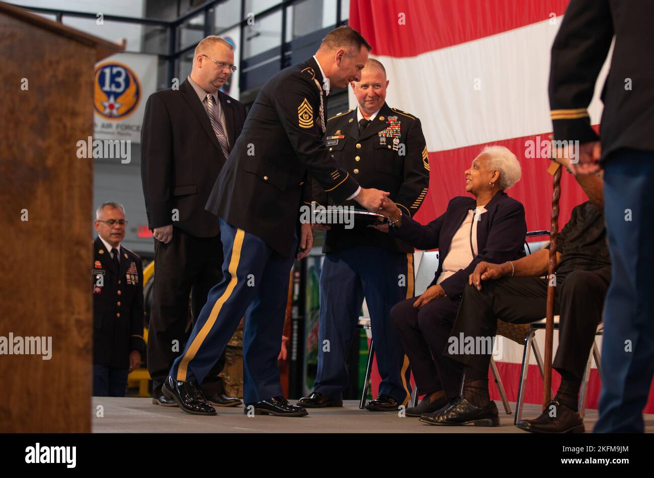 Command Sgt. Maj. Tully Culp shakes hands with Spc. Tarik Seaberry's ...